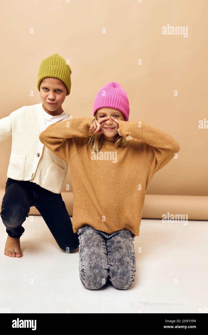 happy children with light brown hair beige background Stock Photo - Alamy
