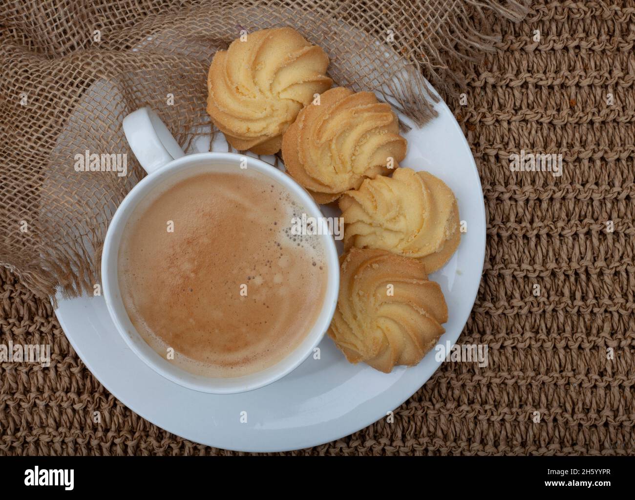 coffee and biscuits on rustic farm style table Stock Photo - Alamy