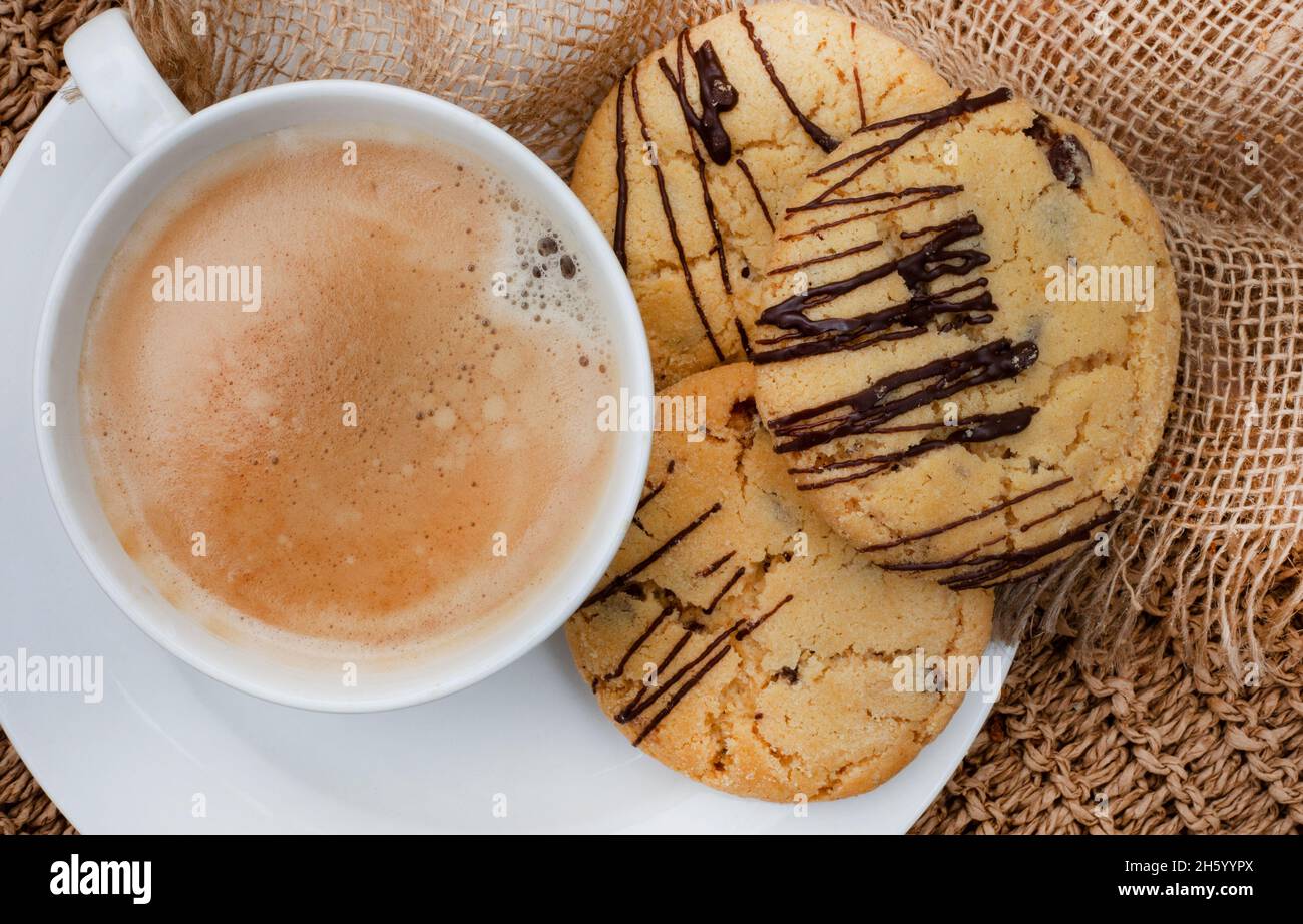 coffee and biscuits on rustic farm style table Stock Photo - Alamy