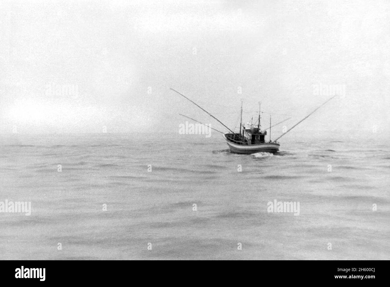 Fishing vessel trolling for tuna in the Atlantic Stock Photo - Alamy