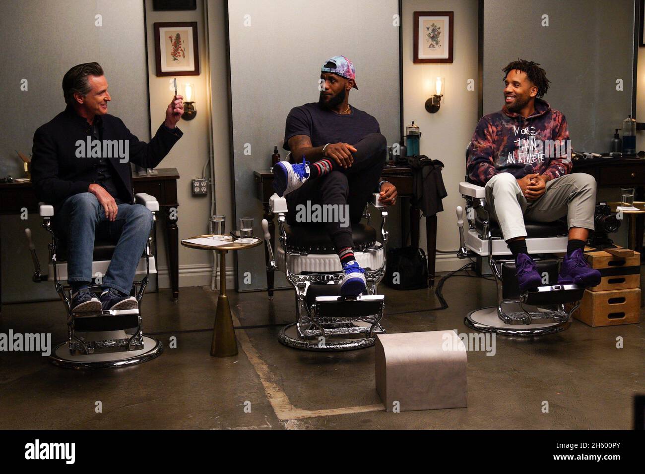 Gavin Newsom showing the pen he signed SB206 with to Lebron James and ...