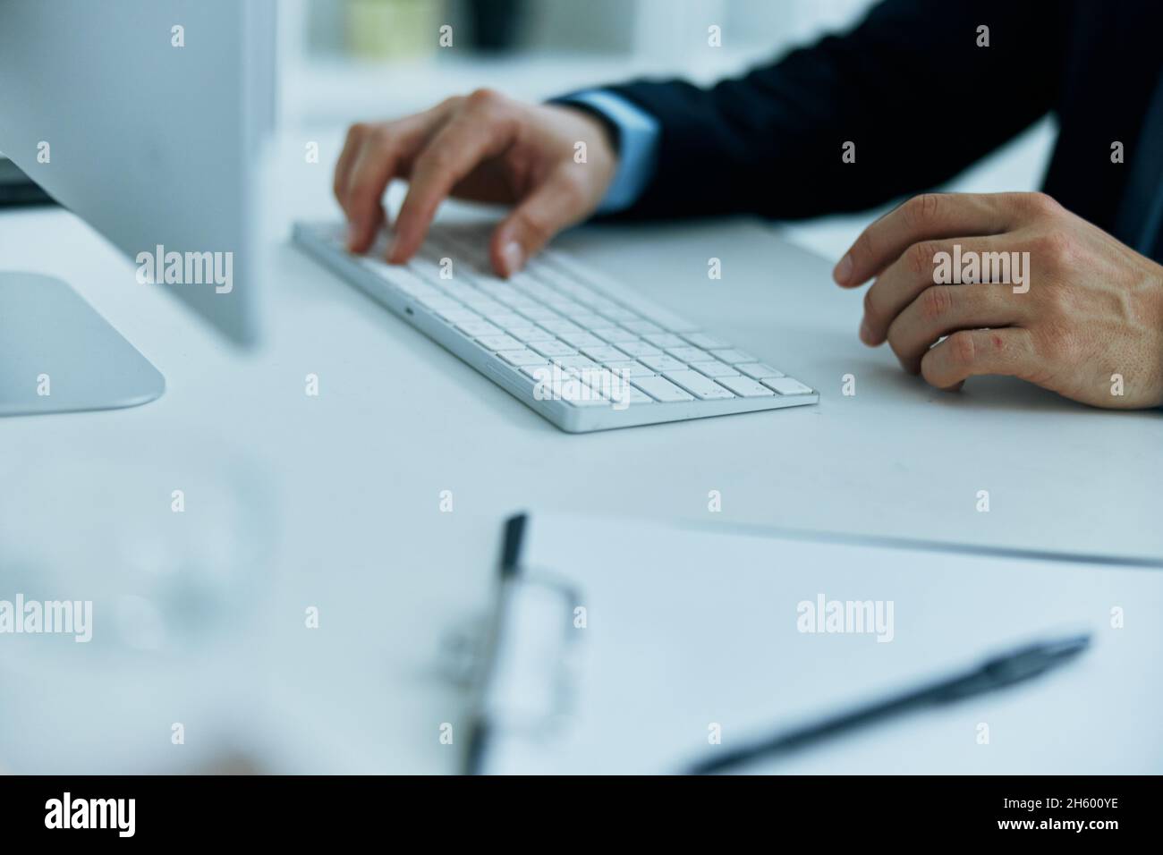 keyboard on desktop hands typing close up Stock Photo - Alamy