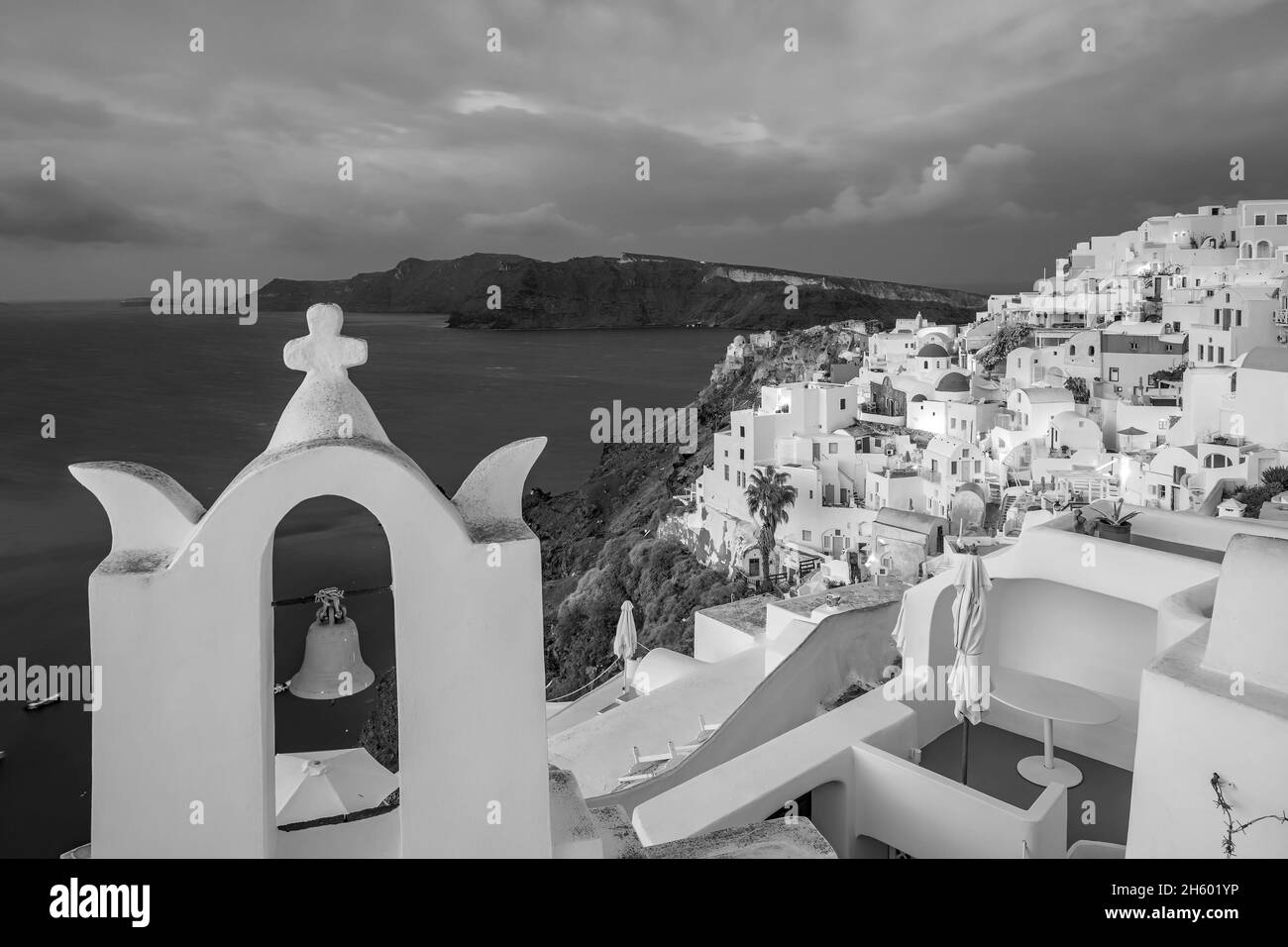 Oia town cityscape at Santorini island in Greece at sunset. Aegean sea ...