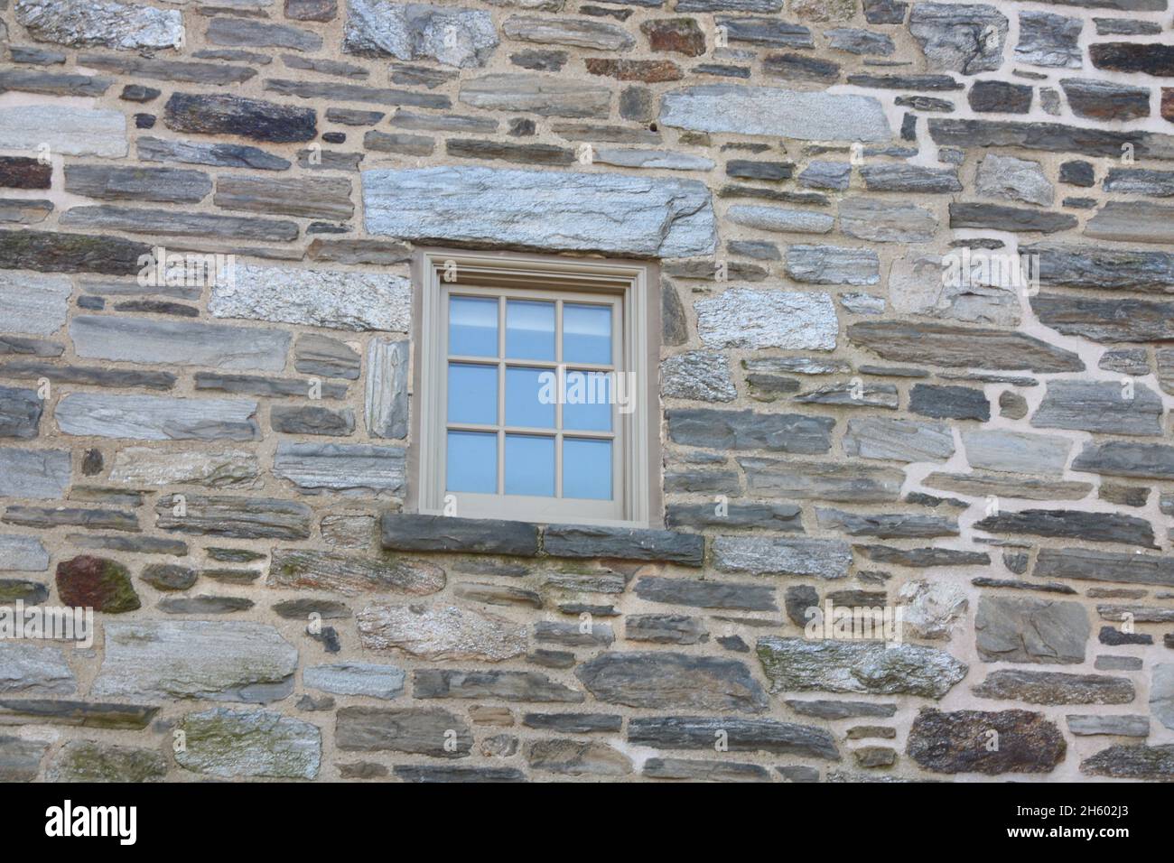 Old stone building with a wind Stock Photo - Alamy