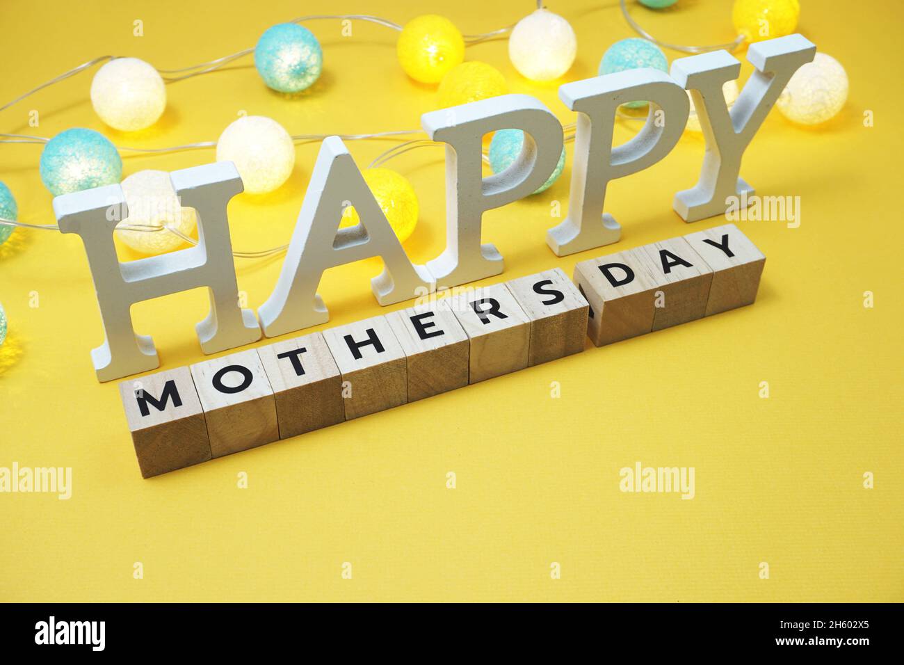 Happy Mothers Day alphabet letter with LED cotton balls on yellow ...