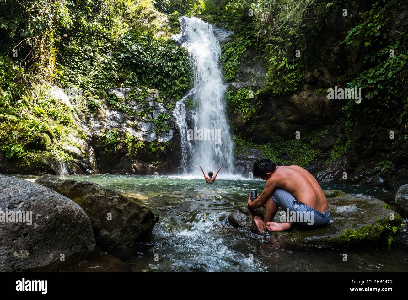 July 2017. Tourists enjoying Imugan Falls which attracts weekend ...