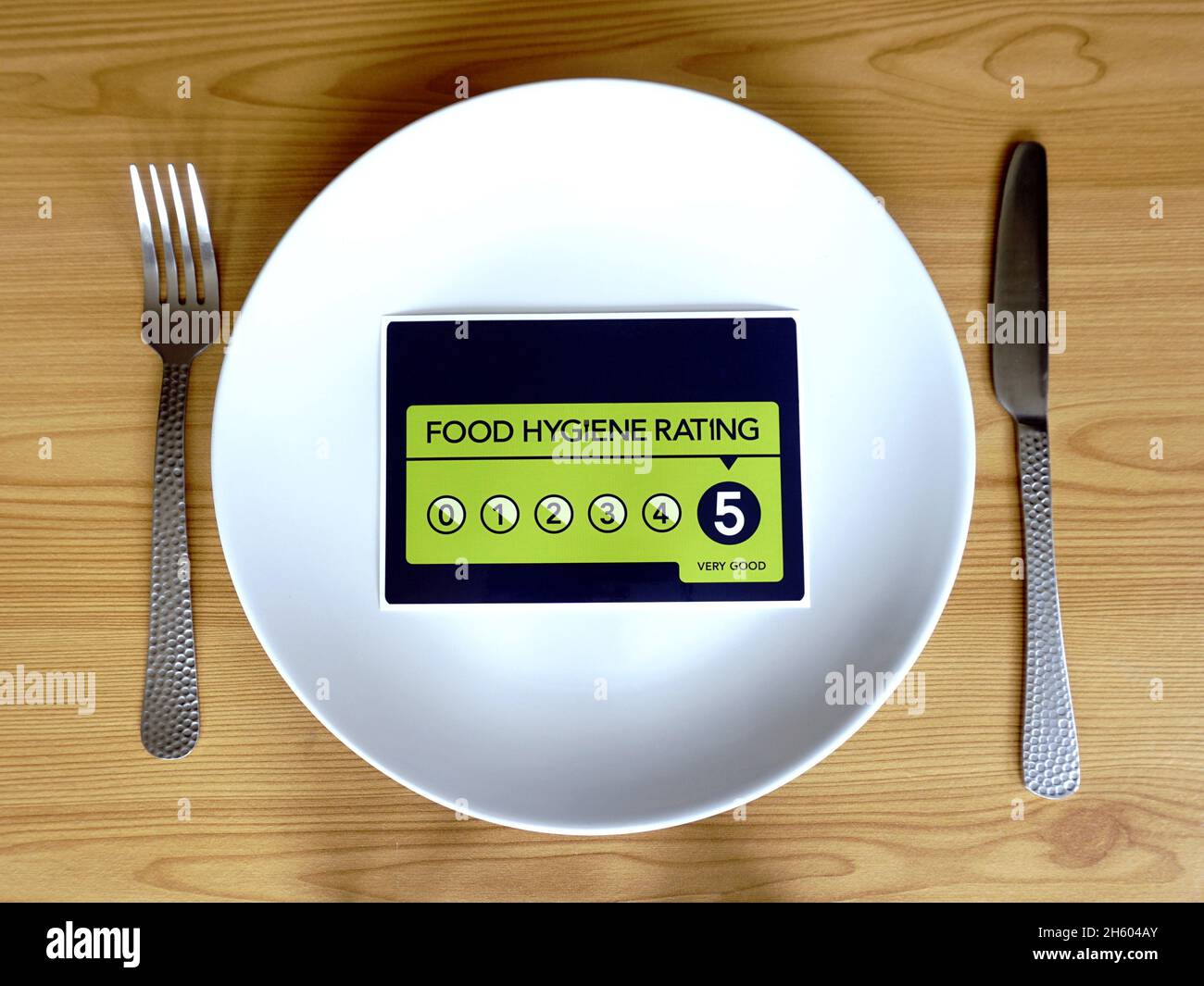 Dinner plate with VERY GOOD food hygiene rating instead of food Stock ...