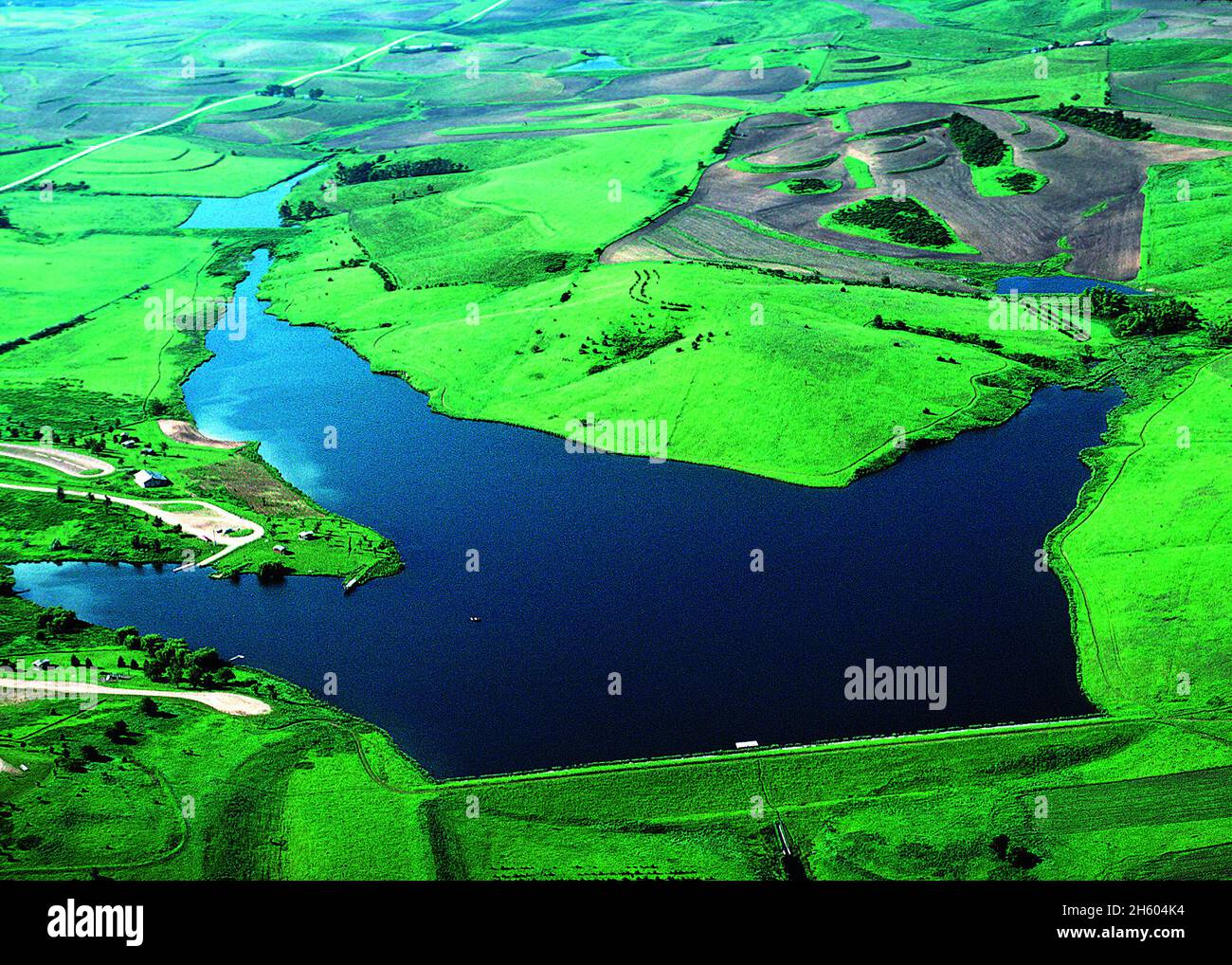 A watershed dam and upland terraces in a small watershed project in ...