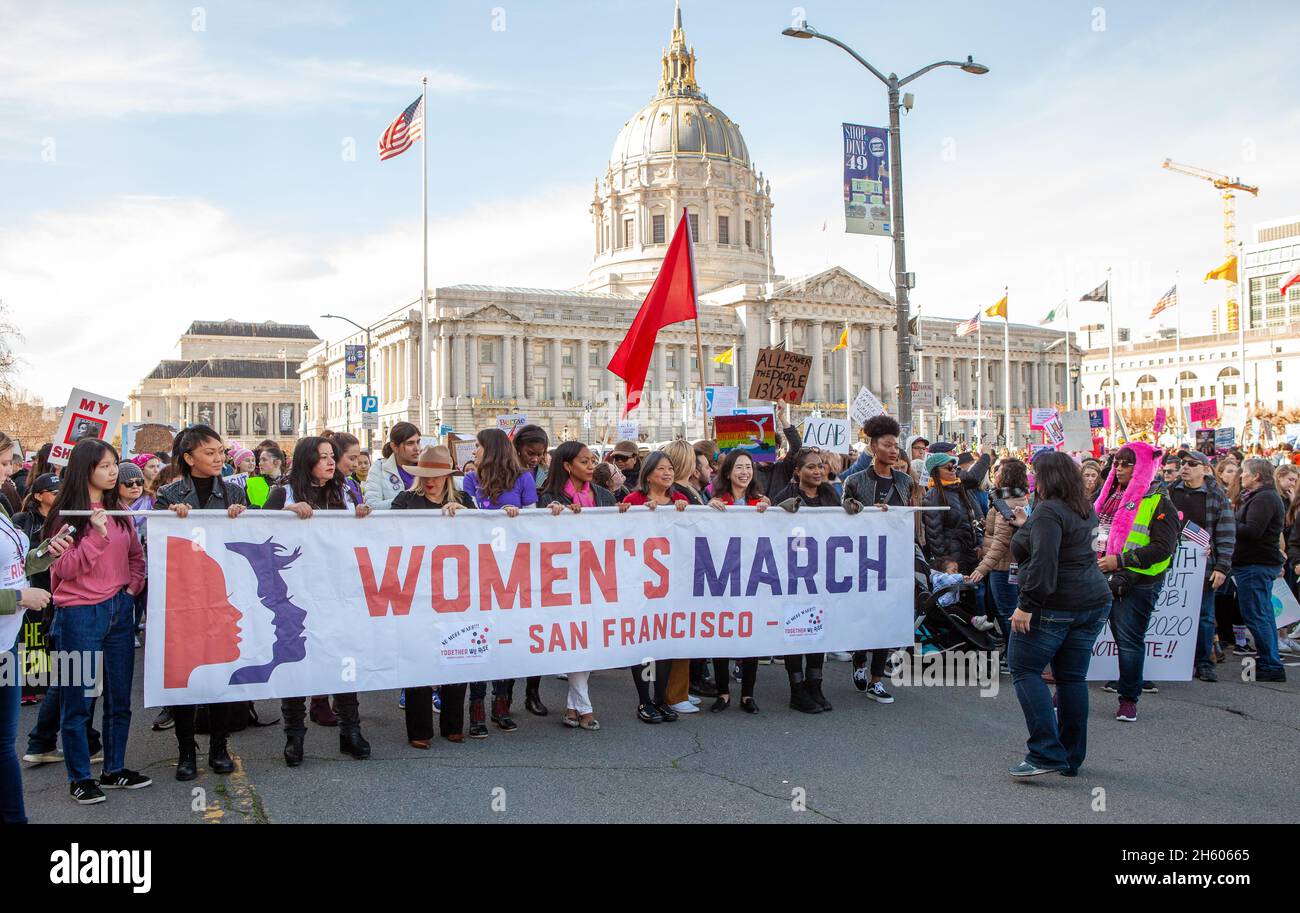 Marchers in the Community Contingent hold an official Women's March San ...