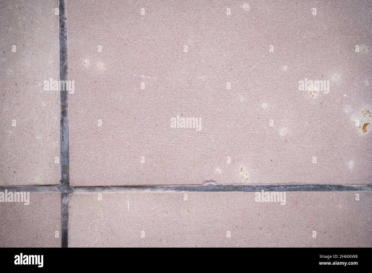 big pink cement tiles with gray seam Stock Photo - Alamy