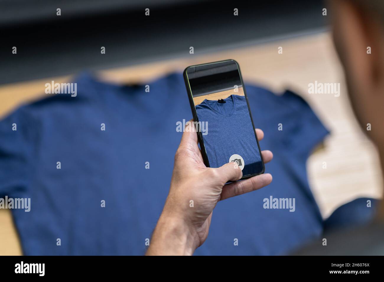 Online Business Using Smartphone. Photographing Fashion Clothes Stock ...