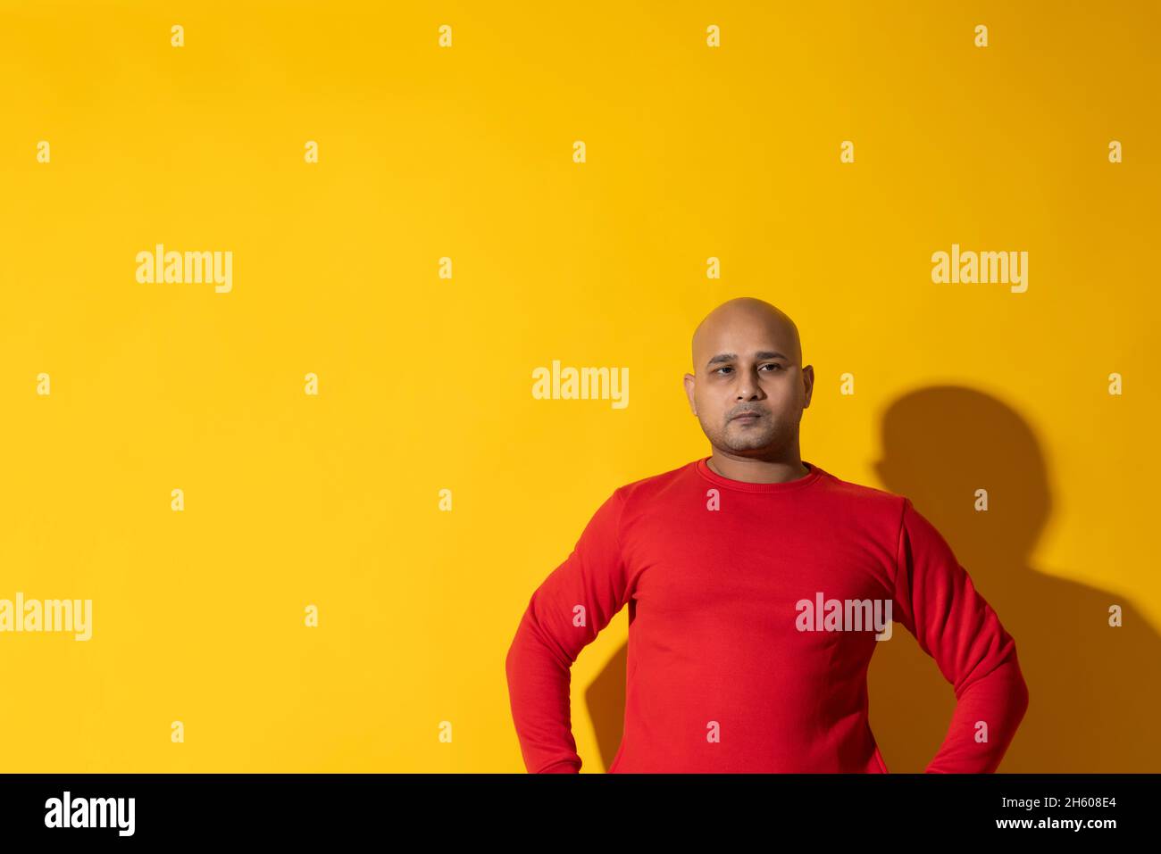 Serious shaved head man hi-res stock photography and images - Alamy