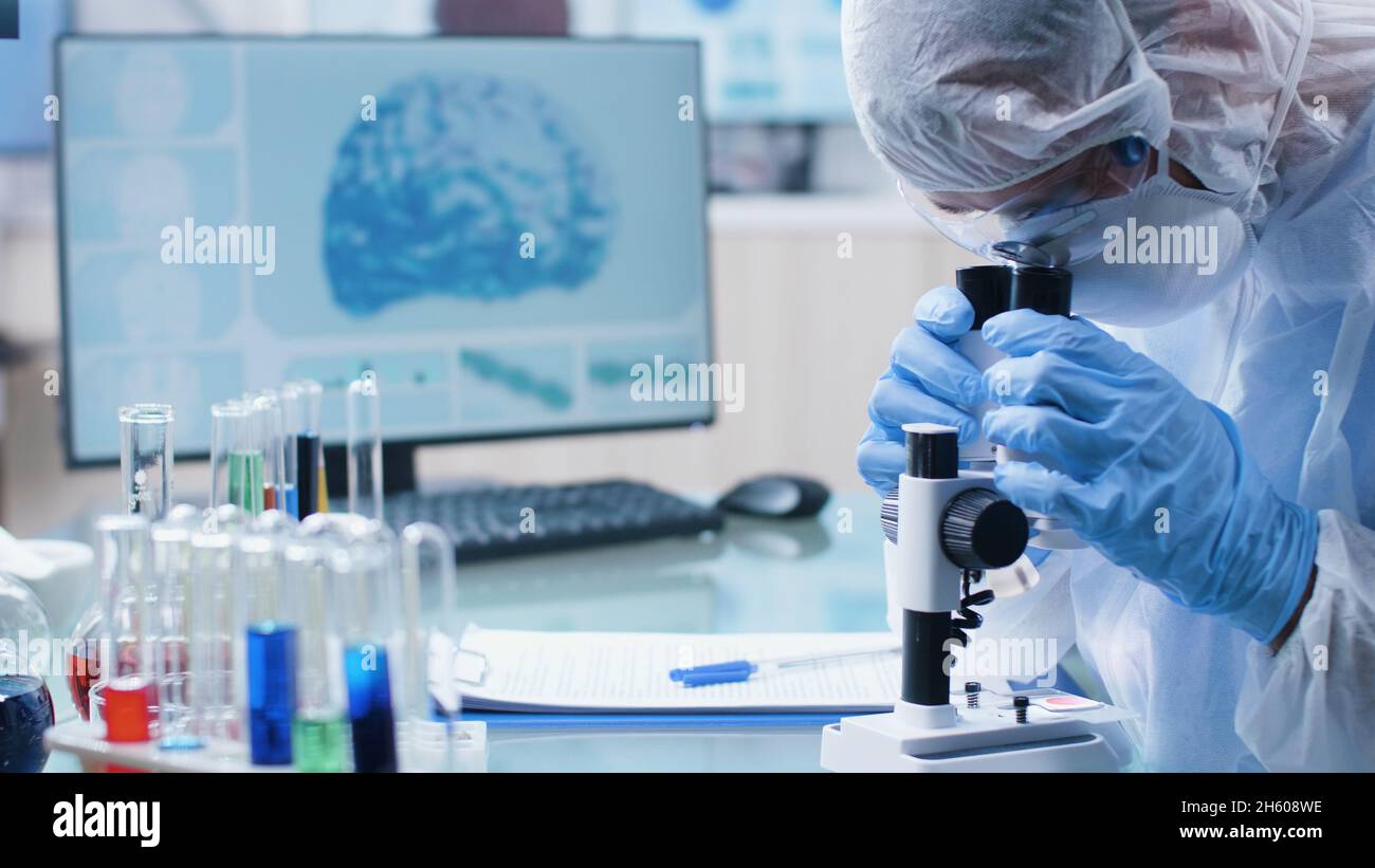 Scientist chemist researcher doctor analyzing dna sample using medical ...