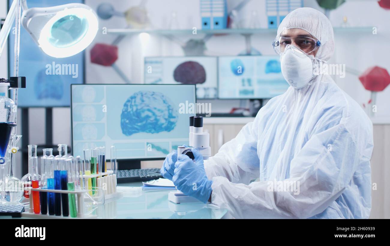 Portrait of scientist researcher developing medical vaccine to prevent ...