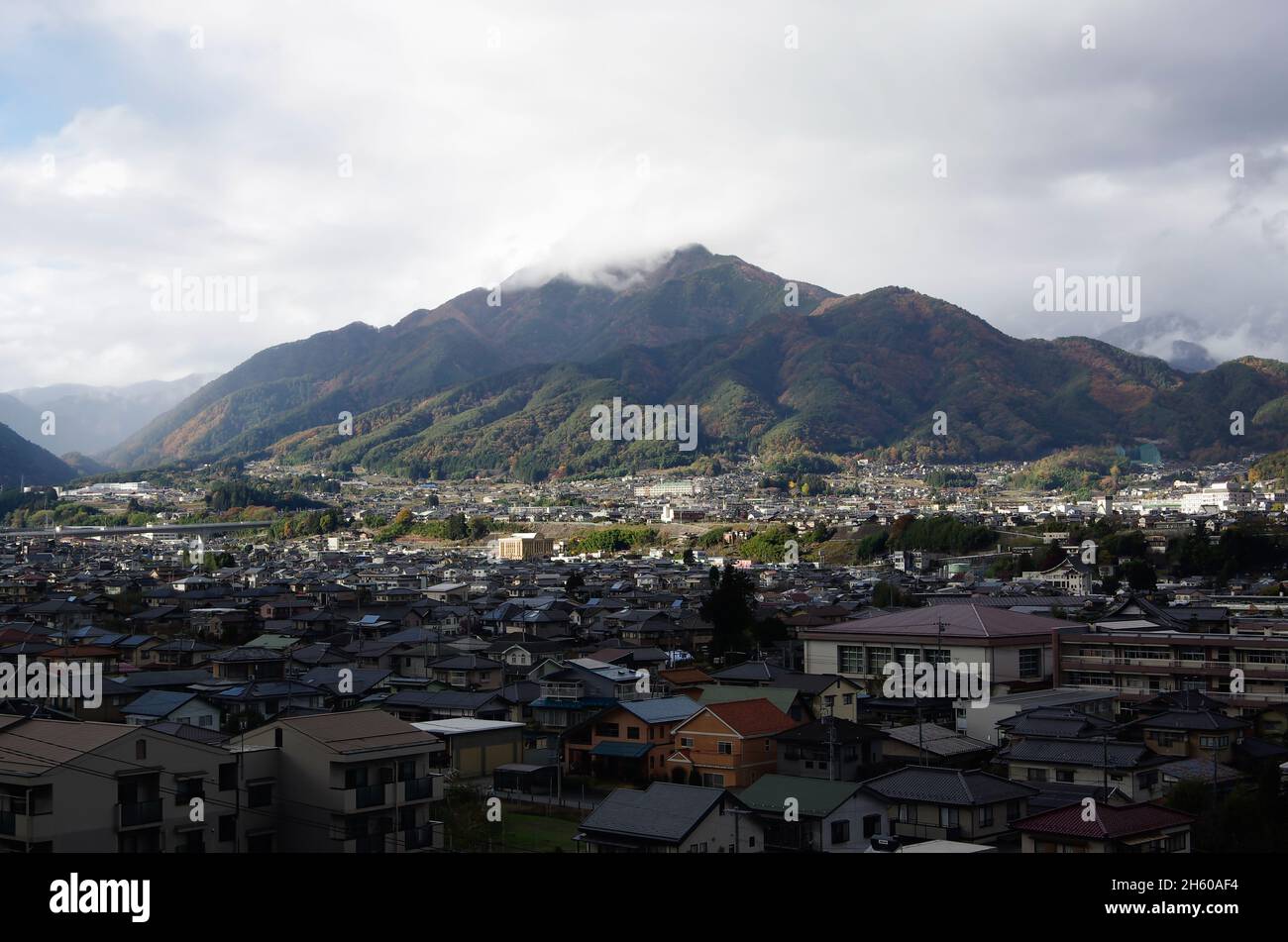 iida, nagano, japan 2021-12-11 , view of iida city from a distance ...