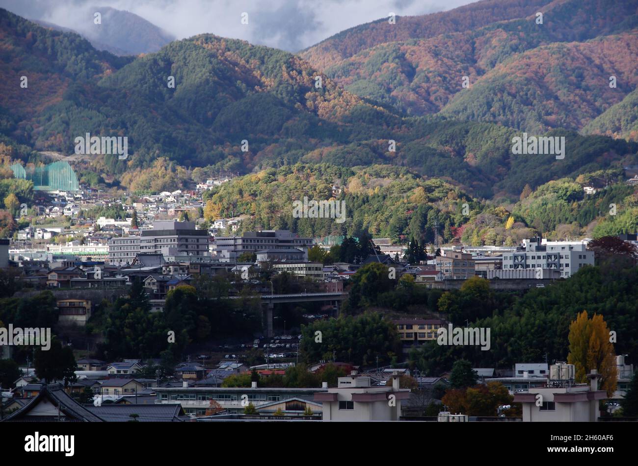 iida, nagano, japan 2021-12-11 , view of iida city from a distance ...
