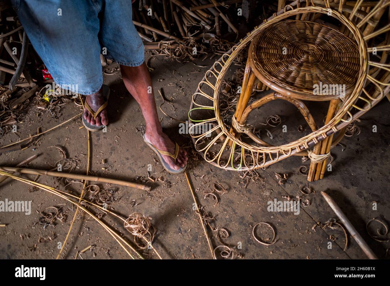 July 2017. Owner, Idevlino Dagot, making rattan furniture at Dagot ...