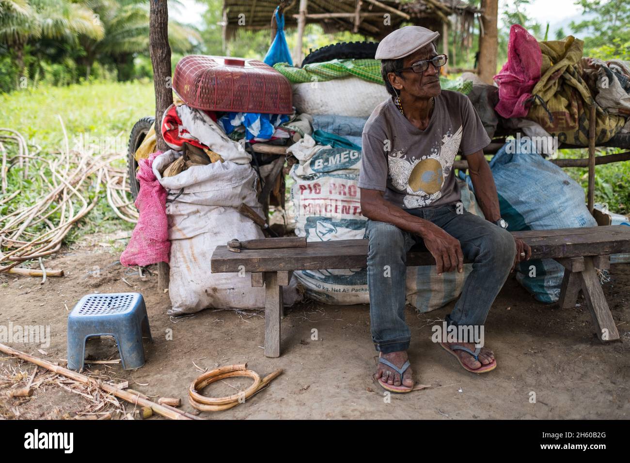 July 2017. Arenesto Deguen making an infant's walker from ratan. Local ...
