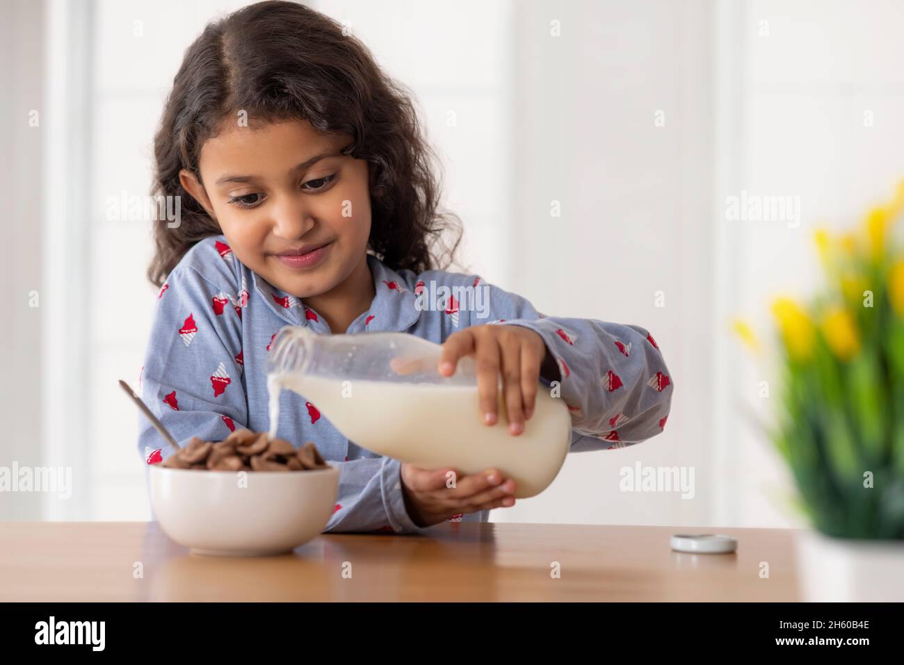 Kid Pouring Milk