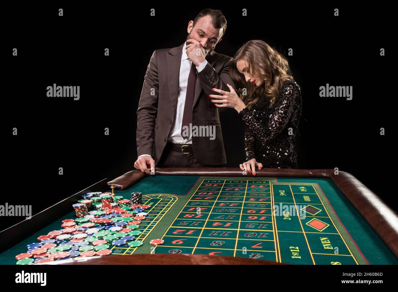 Smiling man celebrating roulette hi-res stock photography and images ...