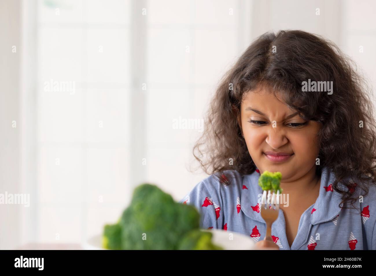 Child with disgusted face hi-res stock photography and images - Alamy