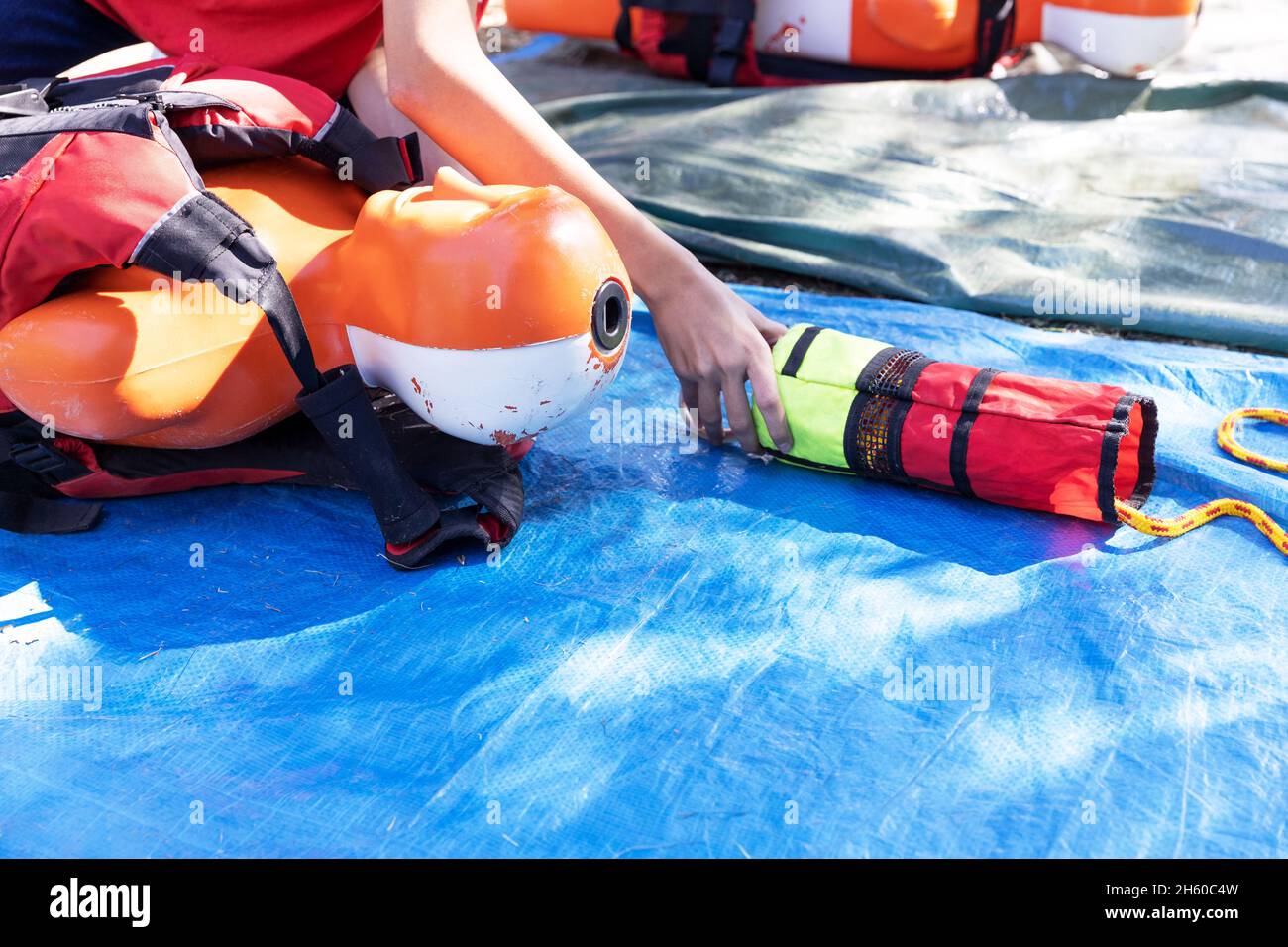 Rescue water dummy in drowning case training Stock Photo - Alamy