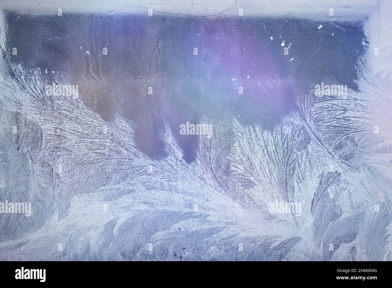 natural frosty patterns on the window glass gradient illumination Stock ...