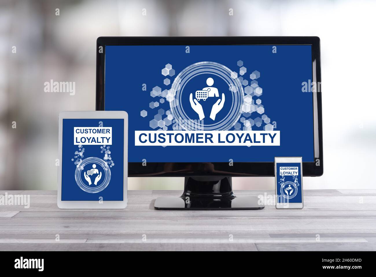 Customer loyalty concept shown on different information technology ...