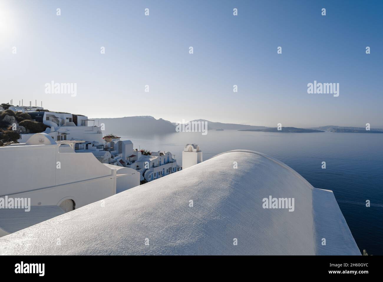 Traditional white buildings and rooftops in the villages of Santorini ...