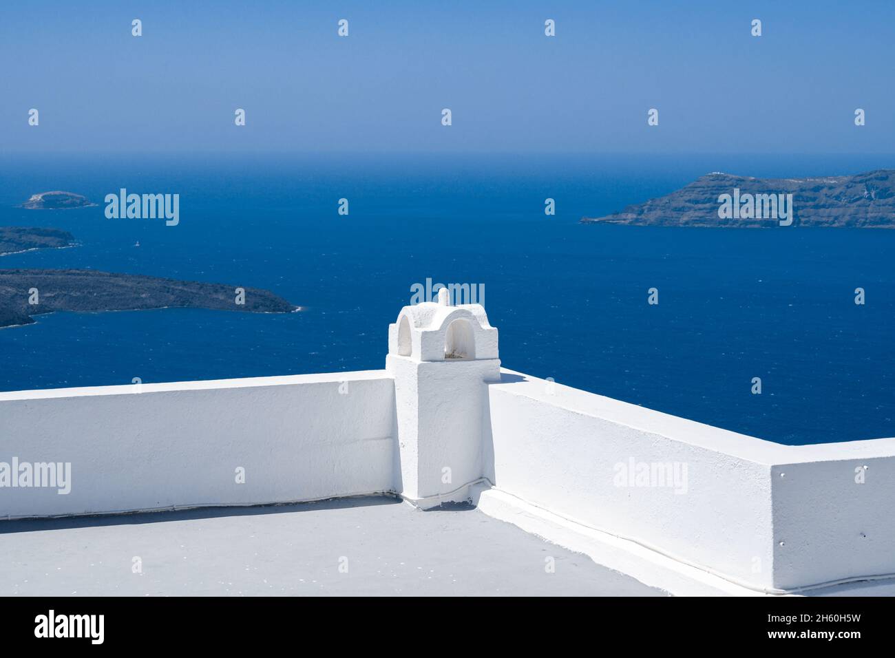 Traditional white buildings and rooftops in the villages of Santorini ...