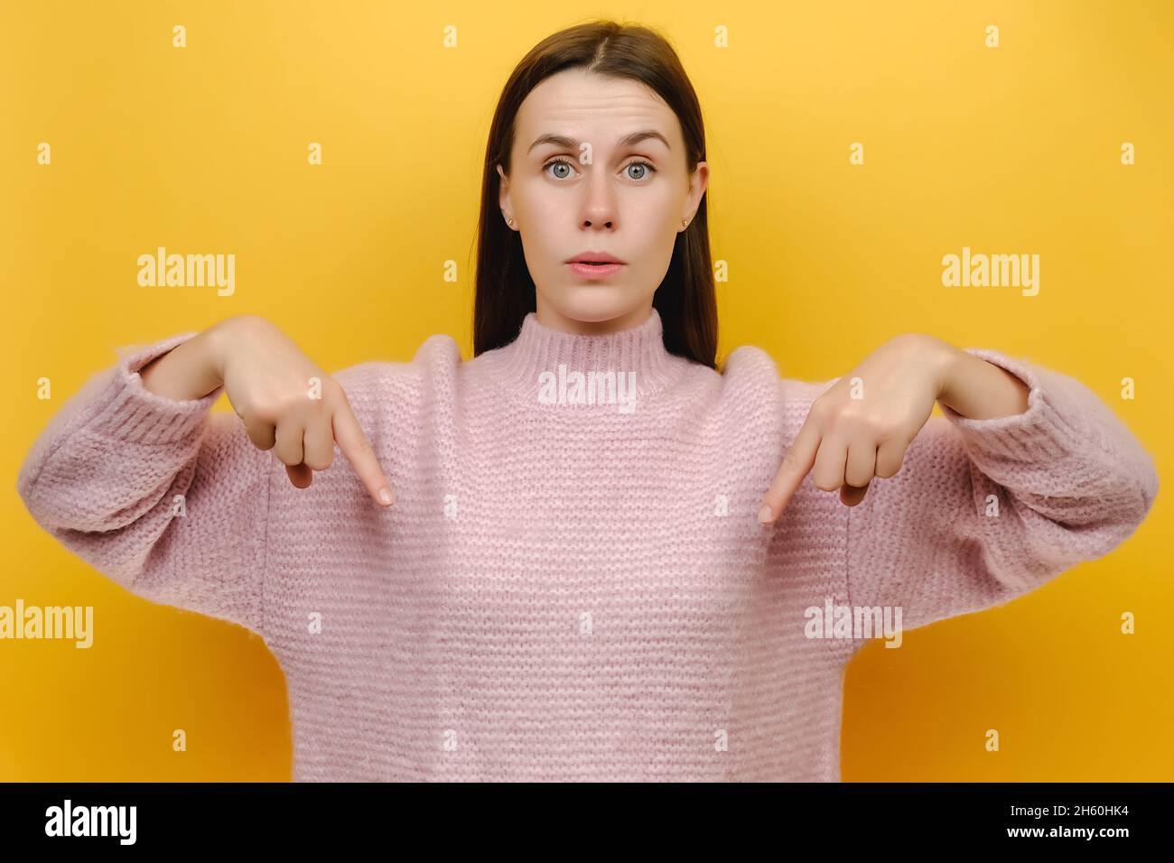 Index finger pointing down hi-res stock photography and images - Alamy