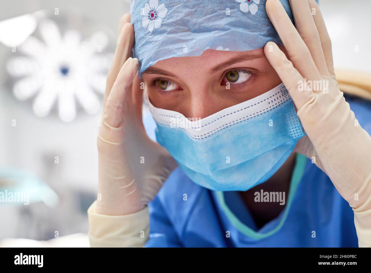 Stressed nurse or operating room nurse after an operation for overwork ...