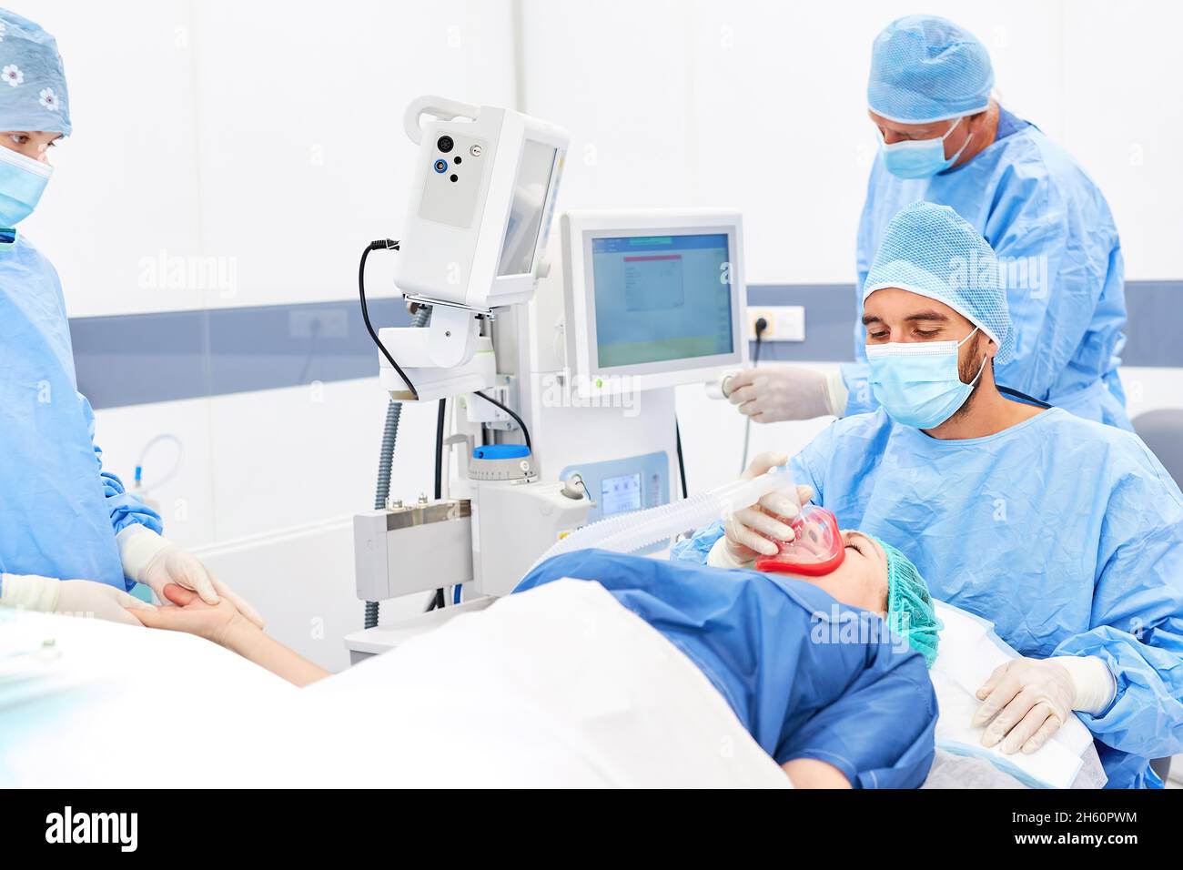Medical team checks and monitors the patient's anesthesia before an ...