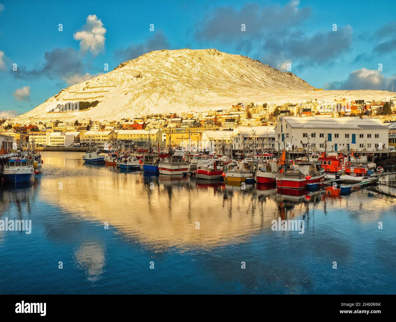 The colourful fishing harbour at Honningsvag. Honningsvag is the ...