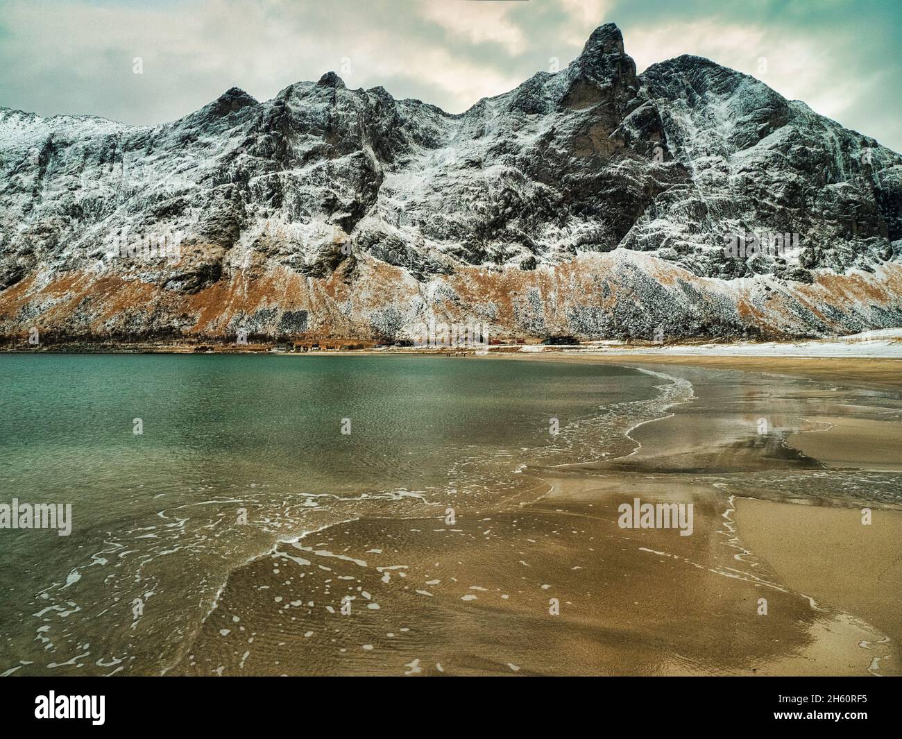 Ersfjord beach with its rugged mountain backdrop. Ersfjord is the only ...