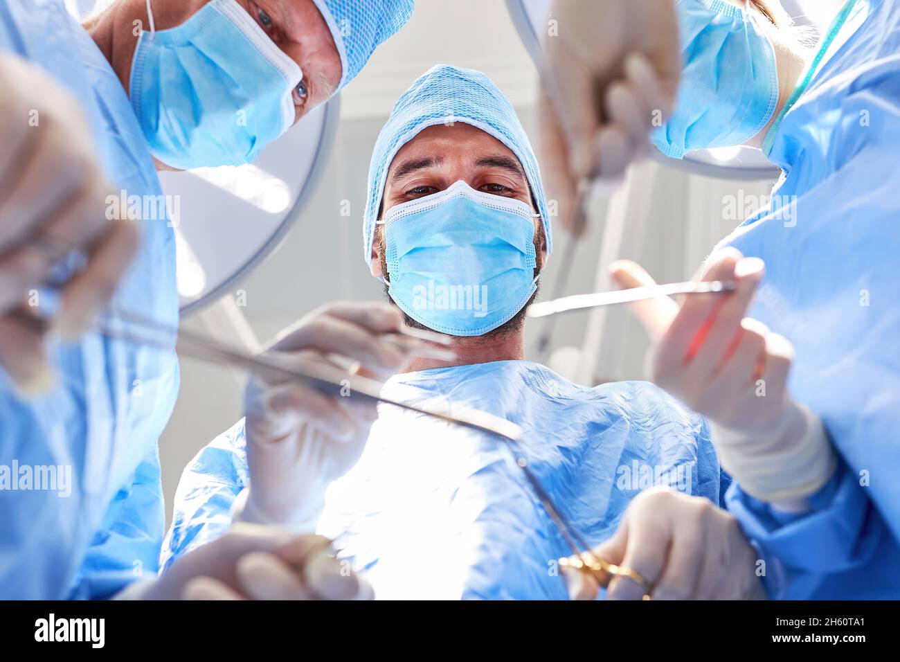 Surgery team works together in a concentrated manner during an ...