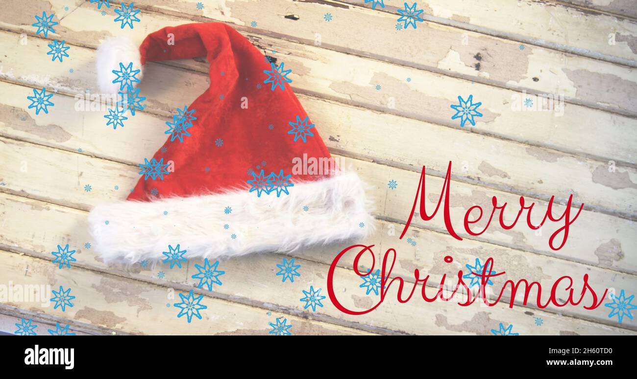 Merry christmas text over hat hi-res stock photography and images - Alamy
