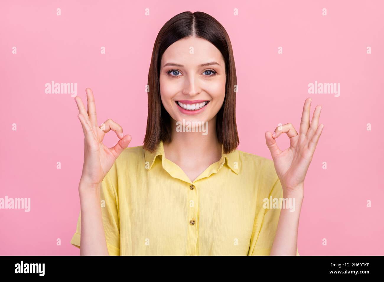 Photo of young girl good mood show okey sign choice recommend advert ...