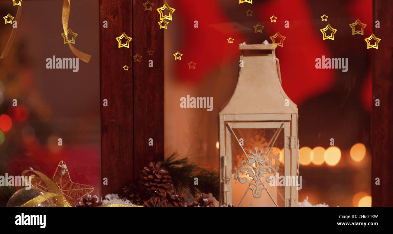 Image of stars falling over winter window with christmas decorations ...