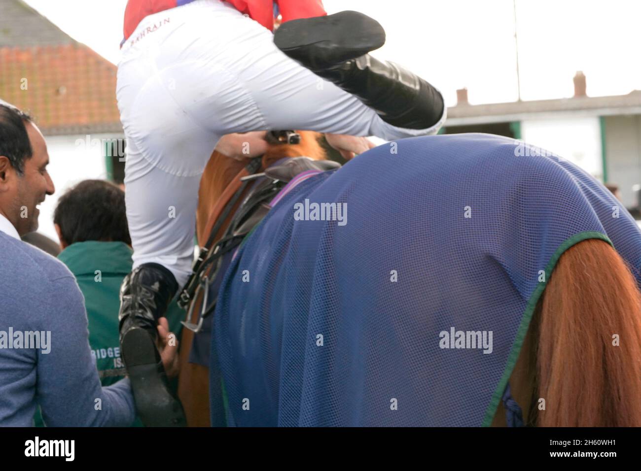 Taste of the atmosphere and thrill of a day at the races with the crowd ...