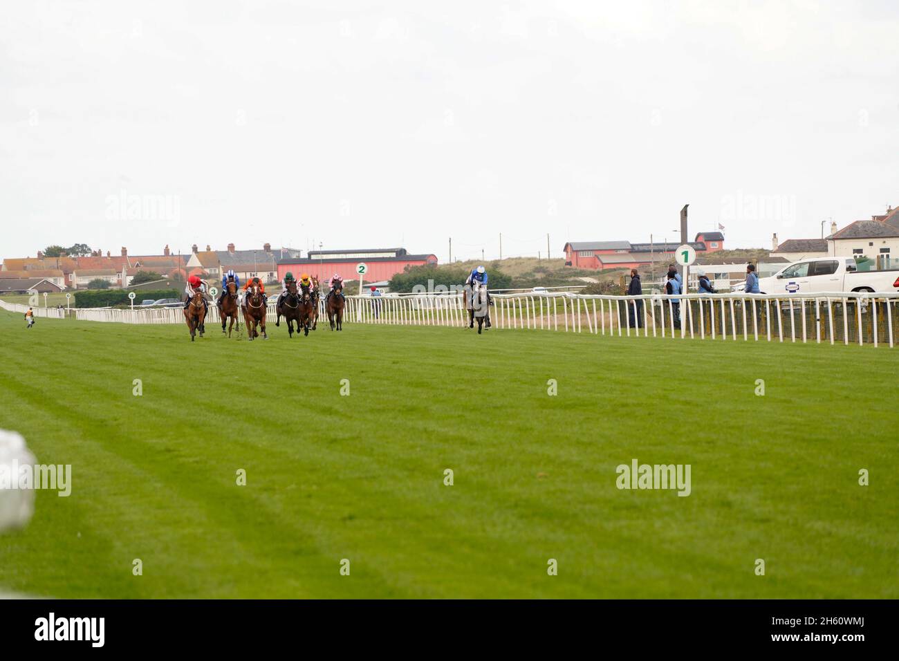 Taste of the atmosphere and thrill of a day at the races with the crowd ...