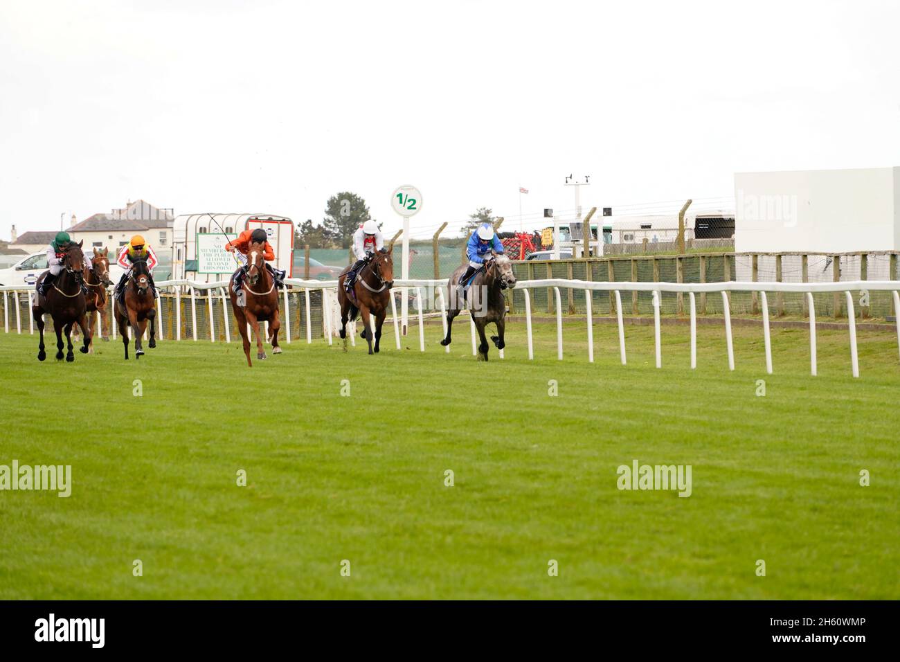 Taste of the atmosphere and thrill of a day at the races with the crowd ...