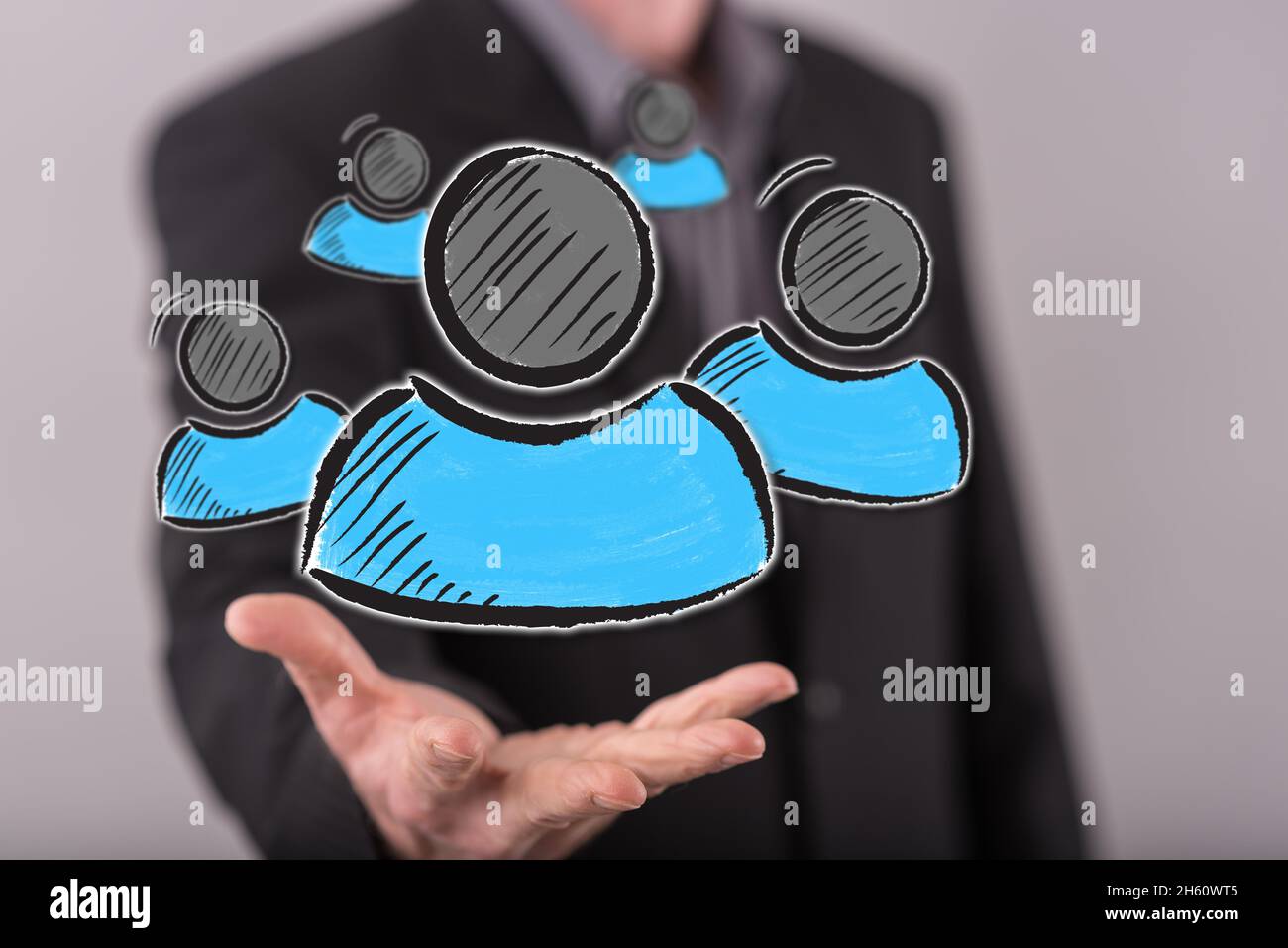 Leadership concept above the hand of a man in background Stock Photo ...