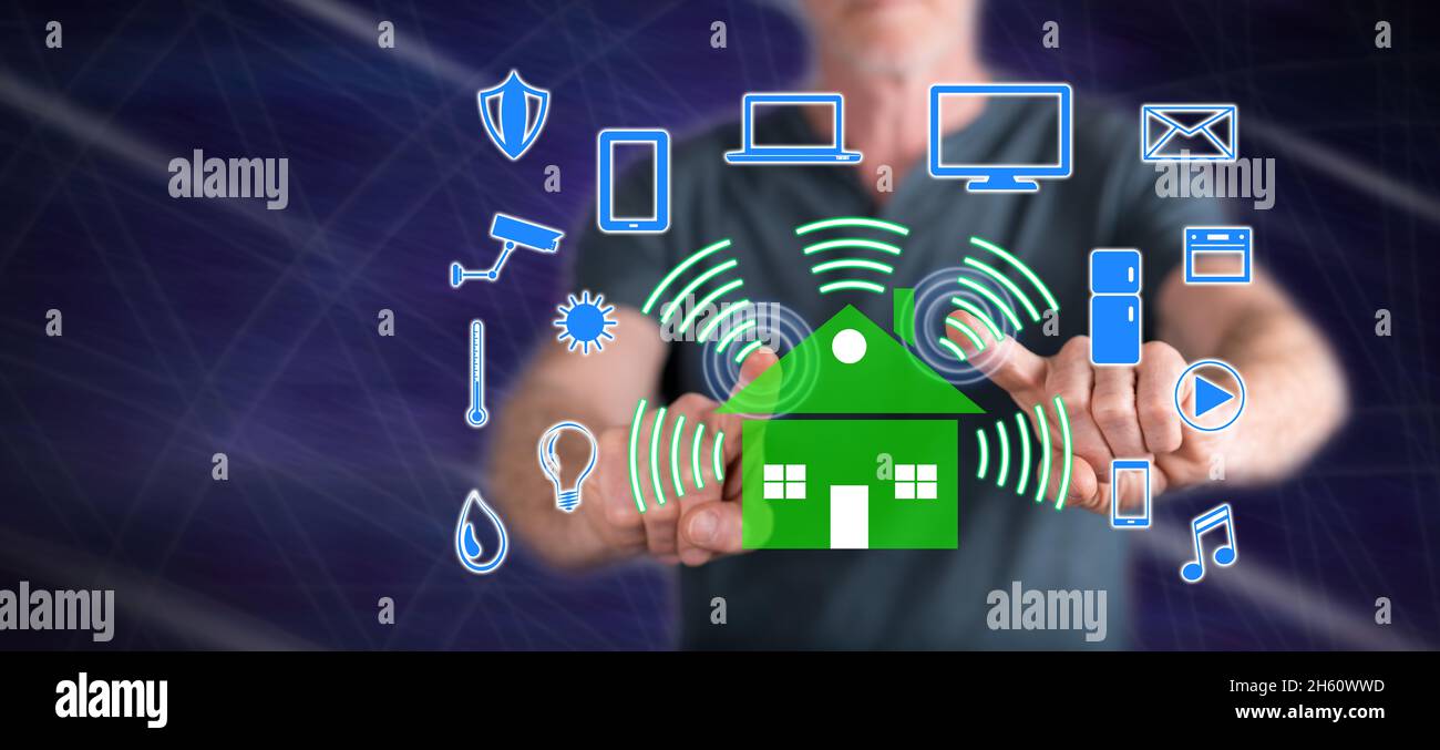 Man touching a smart home concept on a touch screen with his fingers ...
