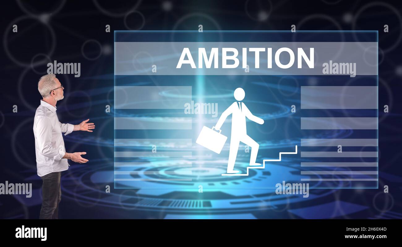 Businessman showing an ambition concept on a wall screen Stock Photo ...