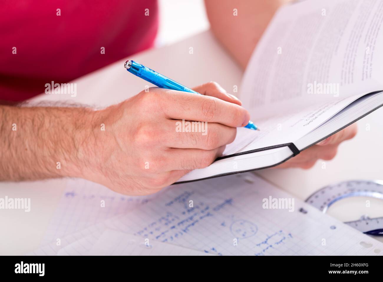Student working for exams Stock Photo - Alamy