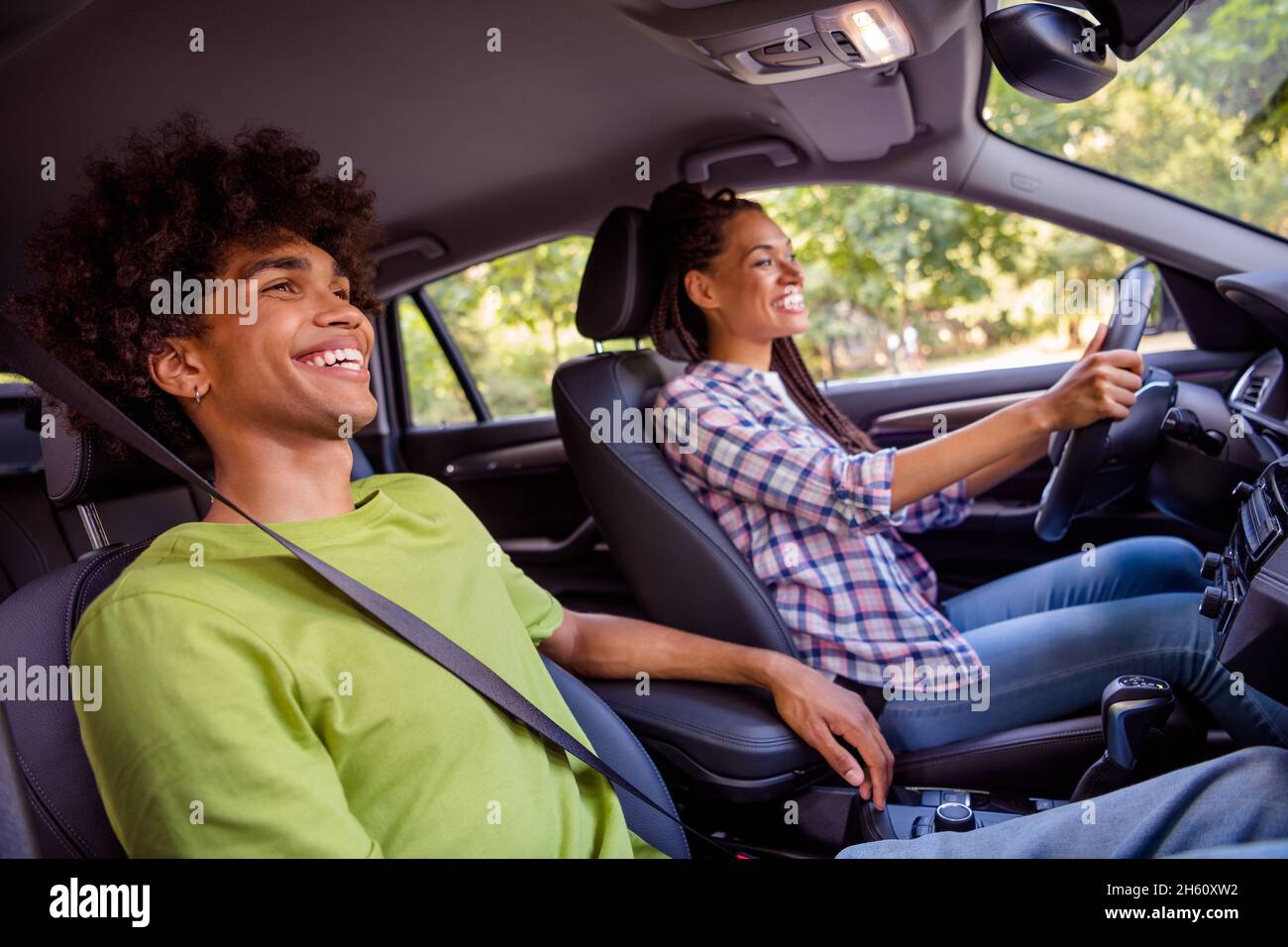 Couple riding in car together hi-res stock photography and images - Alamy