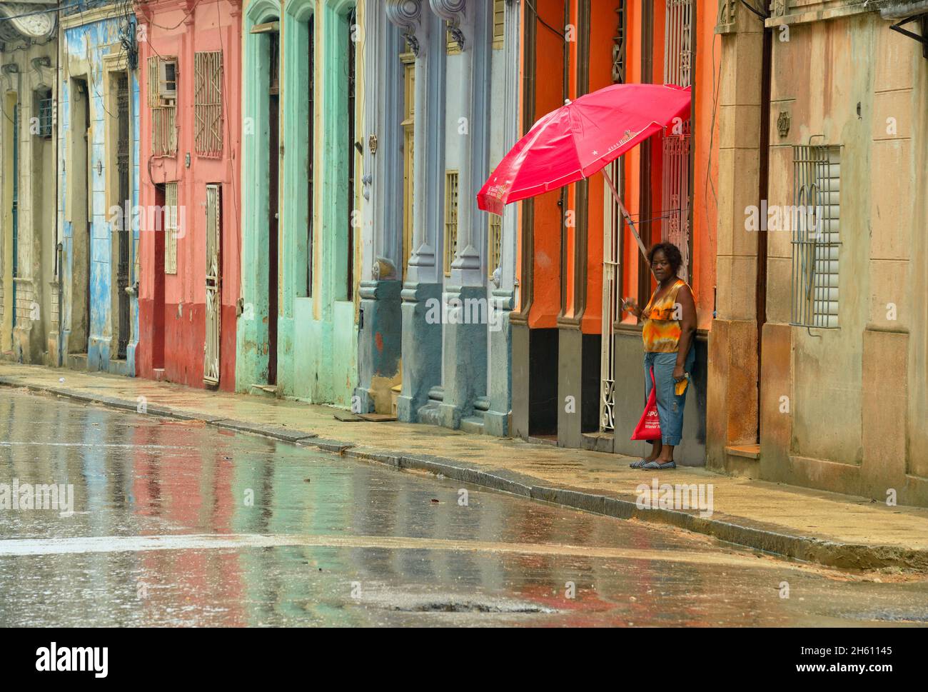 Street scene in central Havana. Reflections on Calle Galiano with ...