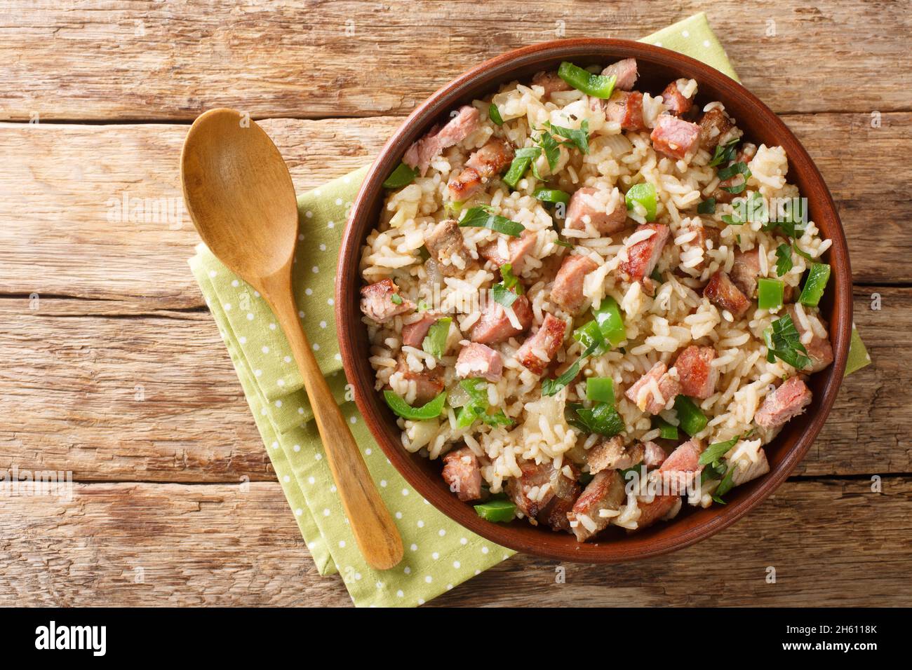 Arroz de Carreteiro Brazilian rice with dried meat close up in the bowl ...
