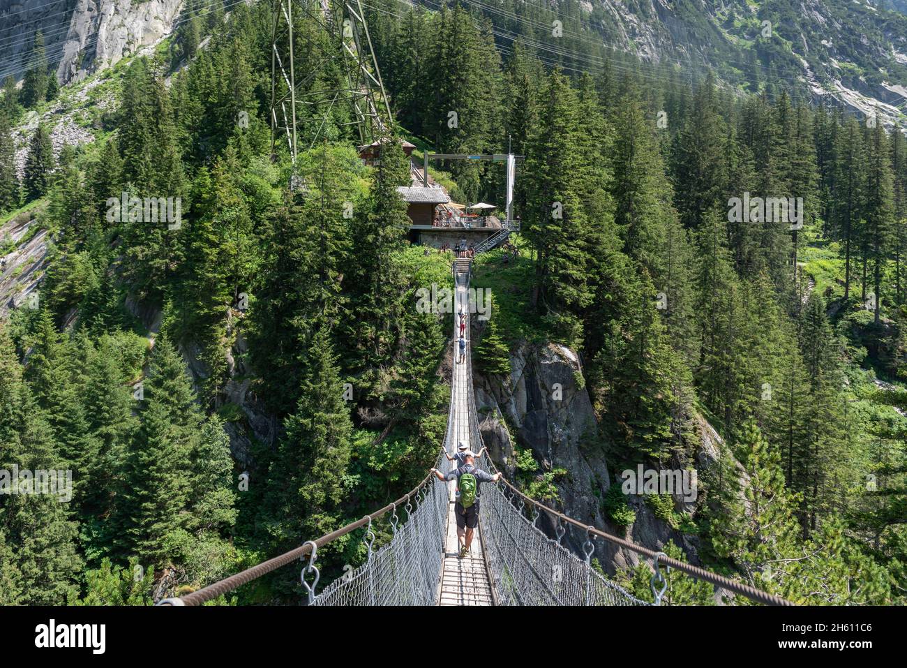 The suspension bridge Handeggfallbruecke, Guttannen, Bernese Oberland ...